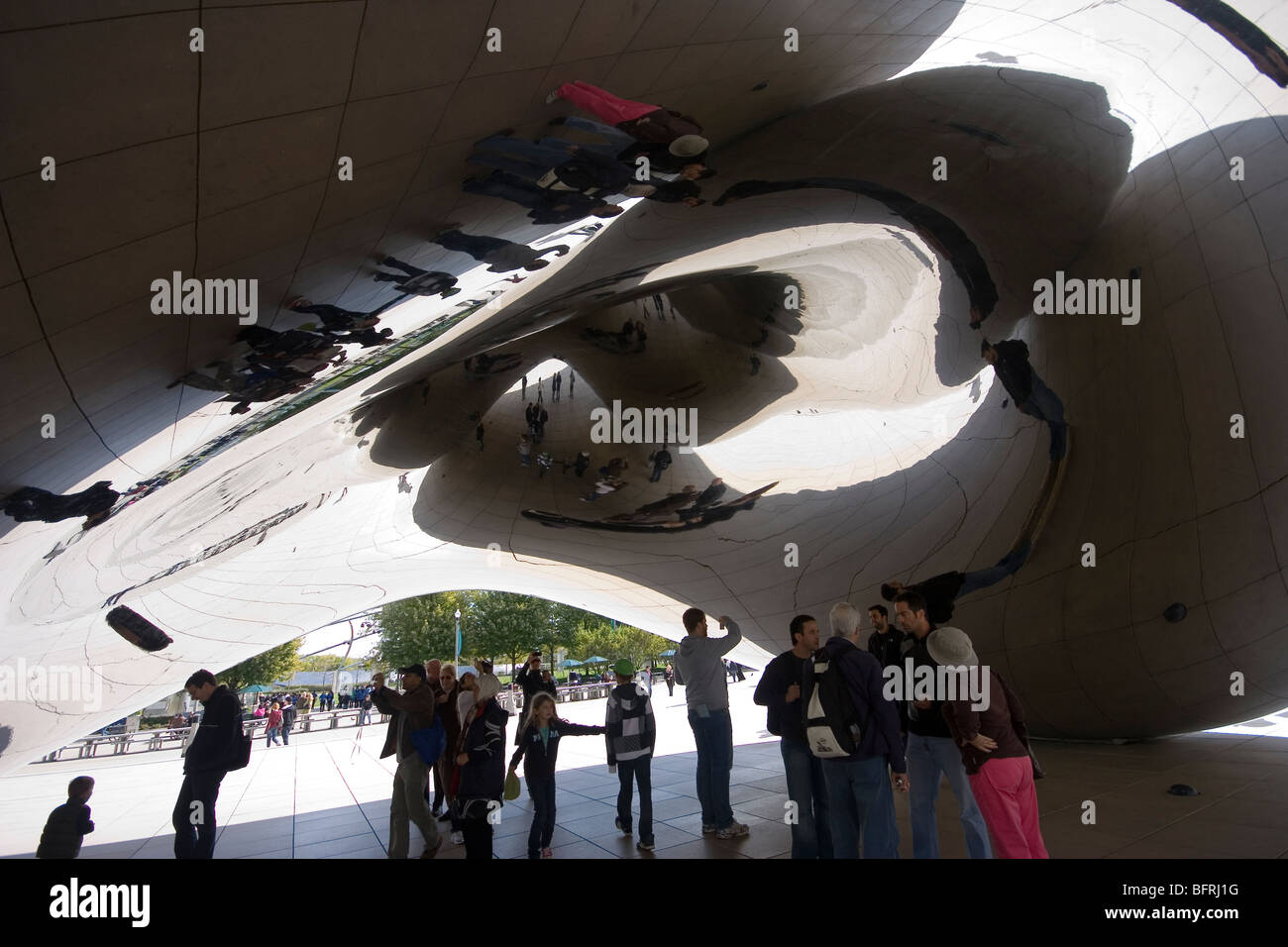 Cloud gate sculpture silver bean in Millennium Park Downtown Chicago ...