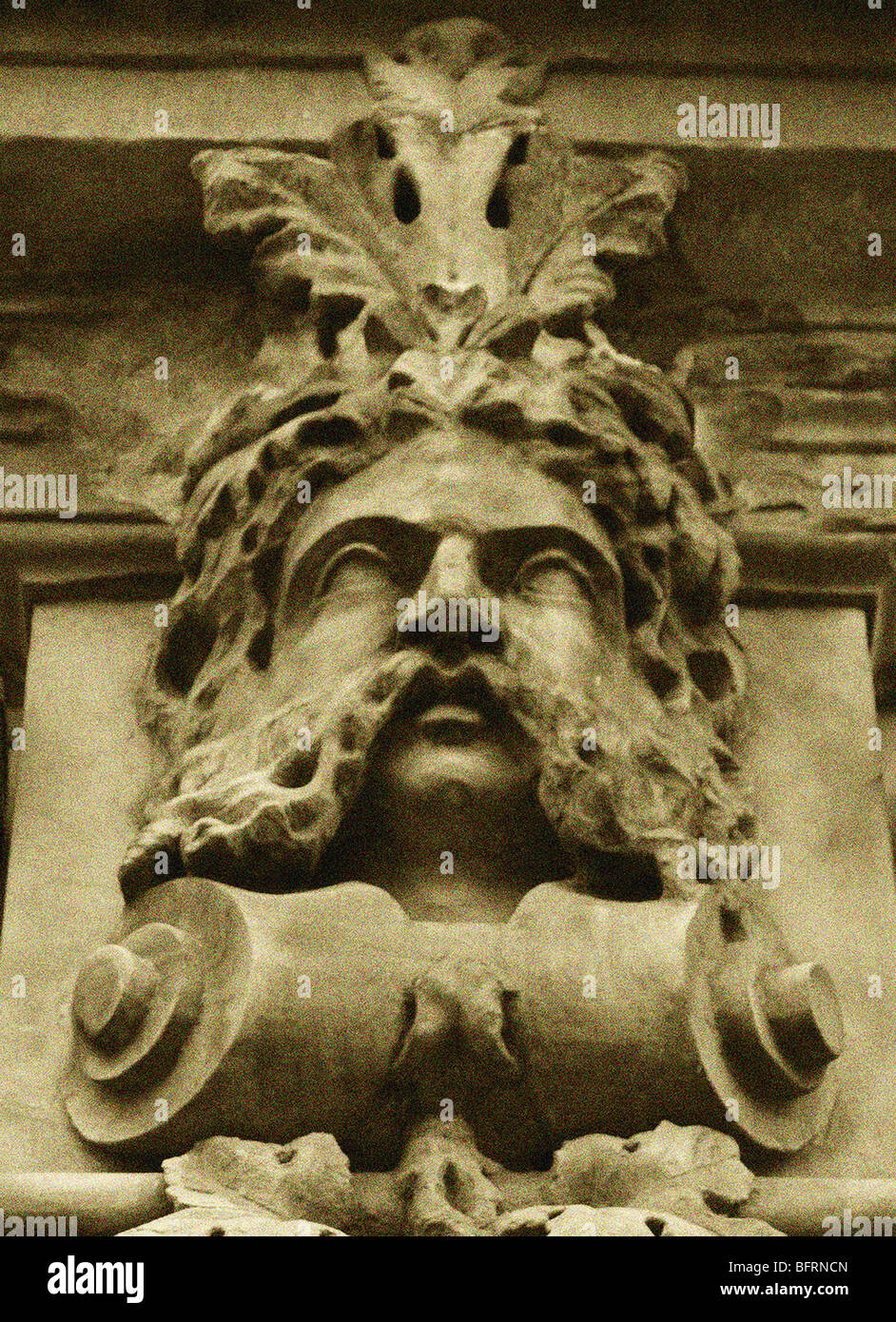 Stonework head carving gargoyle Stock Photo - Alamy