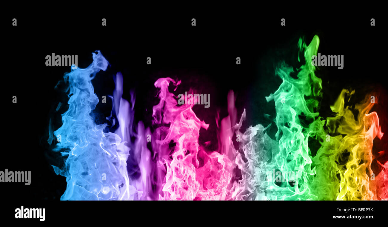 Colored flames against black Stock Photo - Alamy