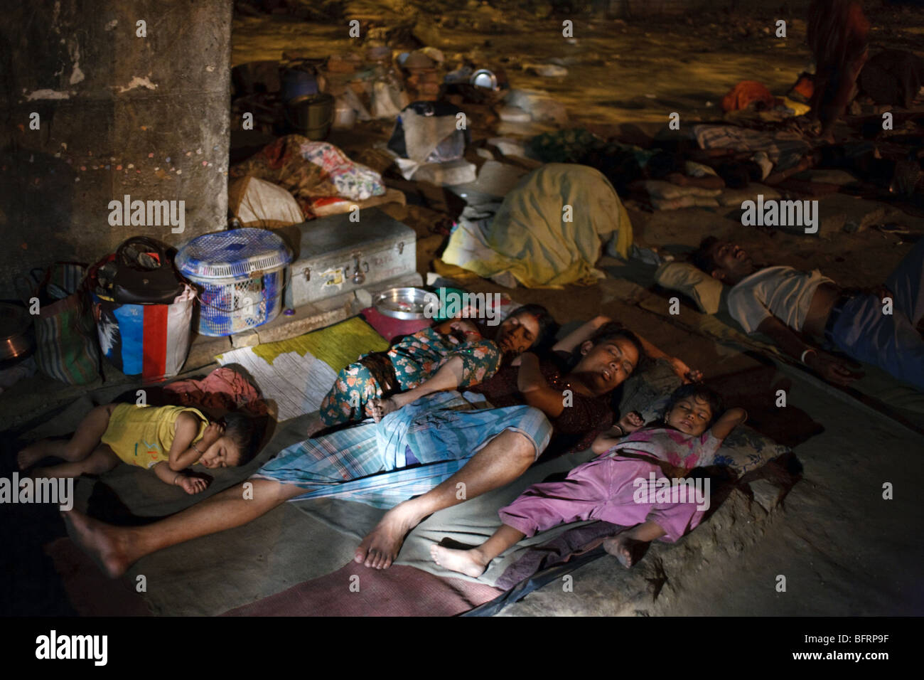 Homeless family sleeping under a bridge in Kolkata, India Stock Photo ...
