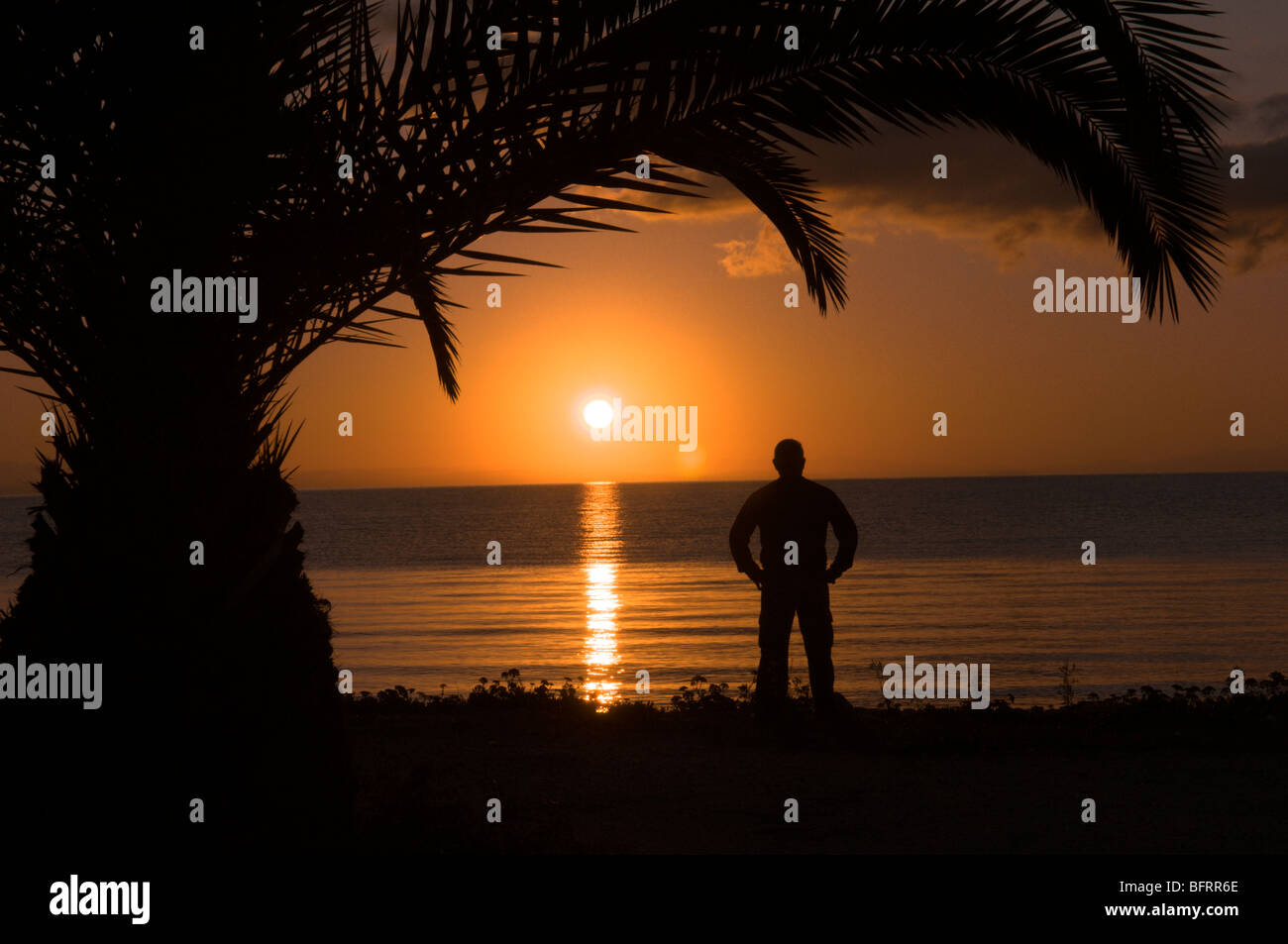 Greece. Zakynthos. Zante. Greek island. October. Man standing looking ...