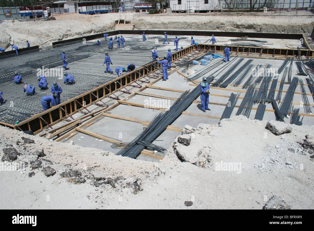 Construction workers middle east qatar doha Stock Photo - Alamy
