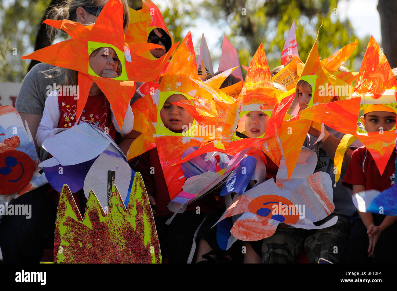 A group of children taking part in a carnival procession on a float ...