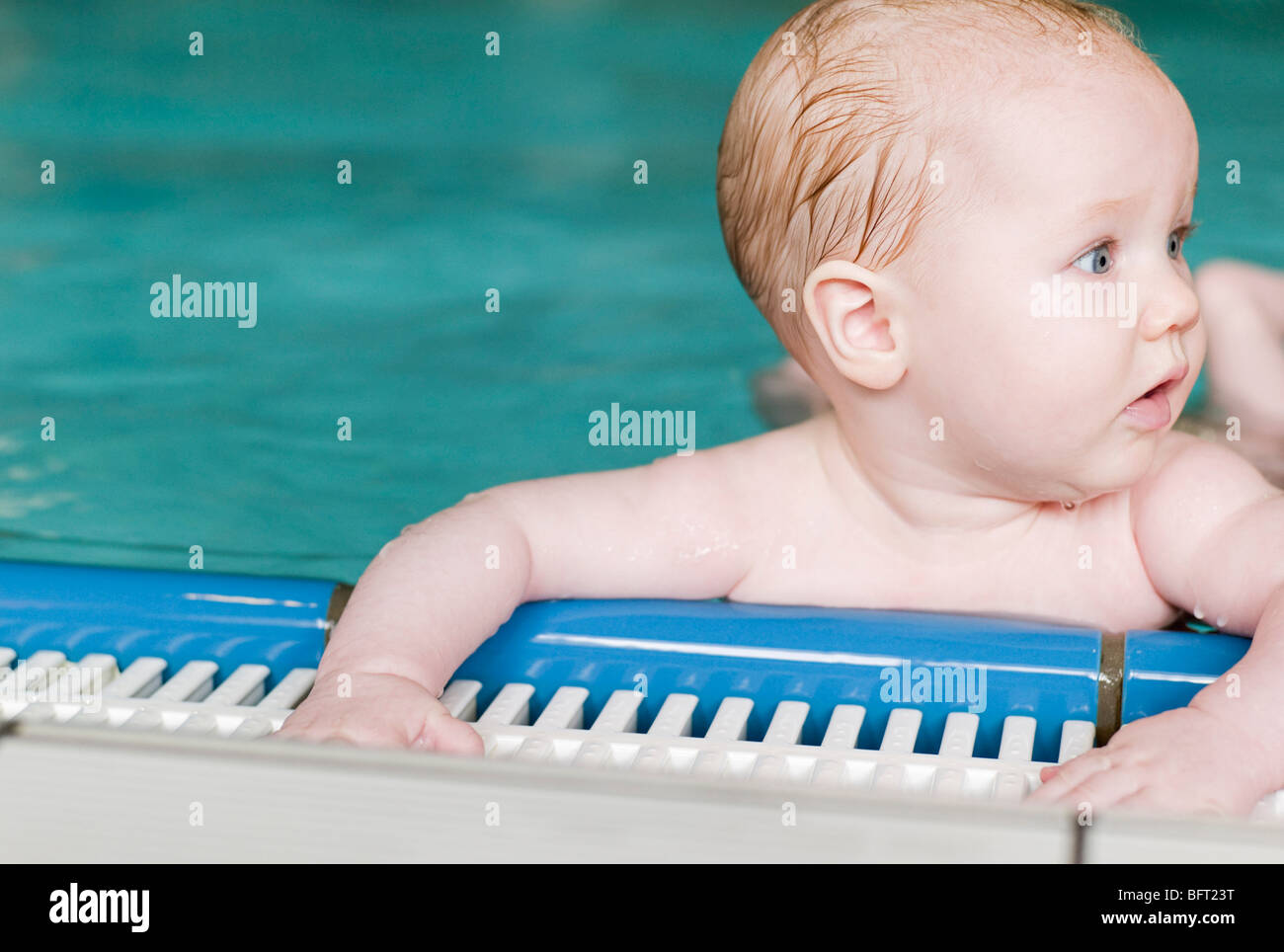 Baby in Swimming Pool Stock Photo - Alamy