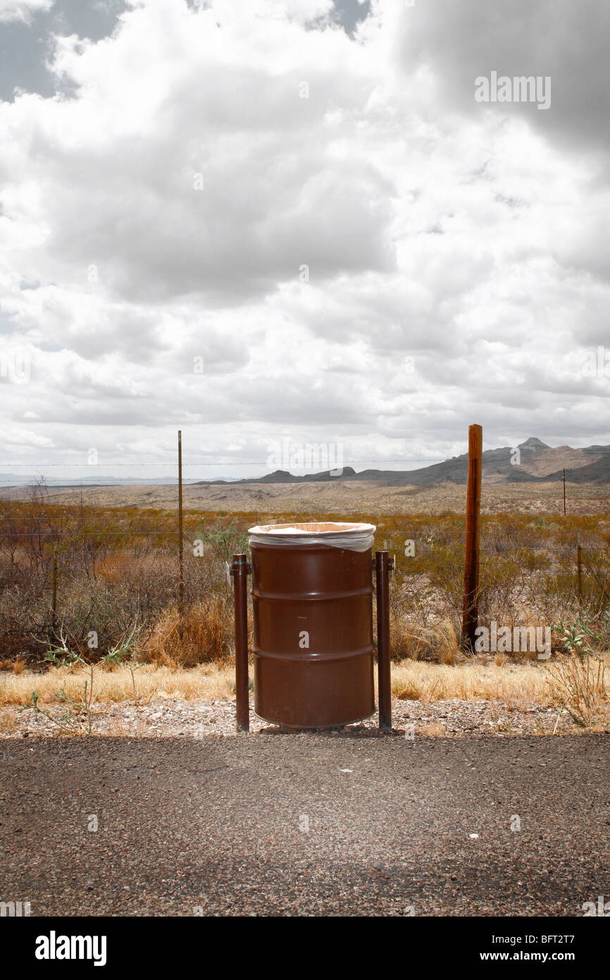 Garbage Can on Side of the Road, Shafter, Texas, USA Stock Photo - Alamy