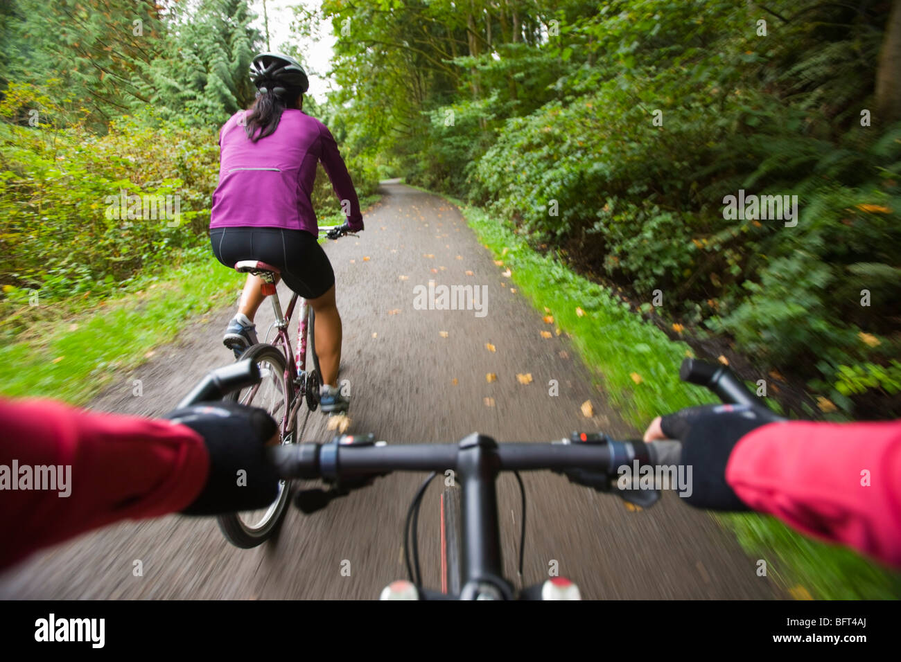 Person riding bike usa lane hi-res stock photography and images - Alamy