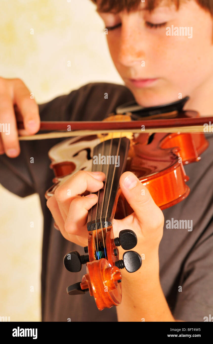 Boy Playing the Violin Stock Photo - Alamy