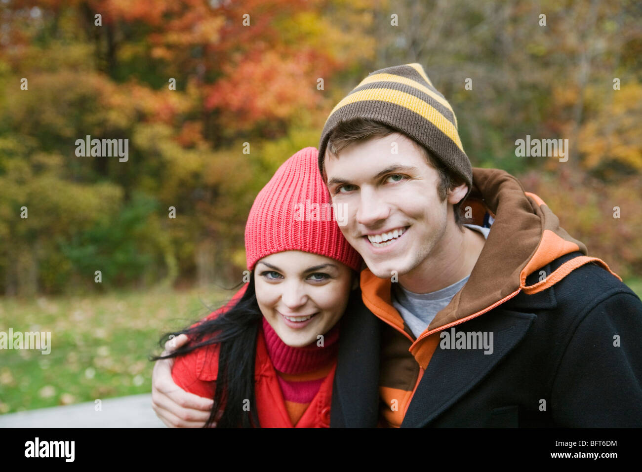 Pleased couple in autumn hi-res stock photography and images - Alamy