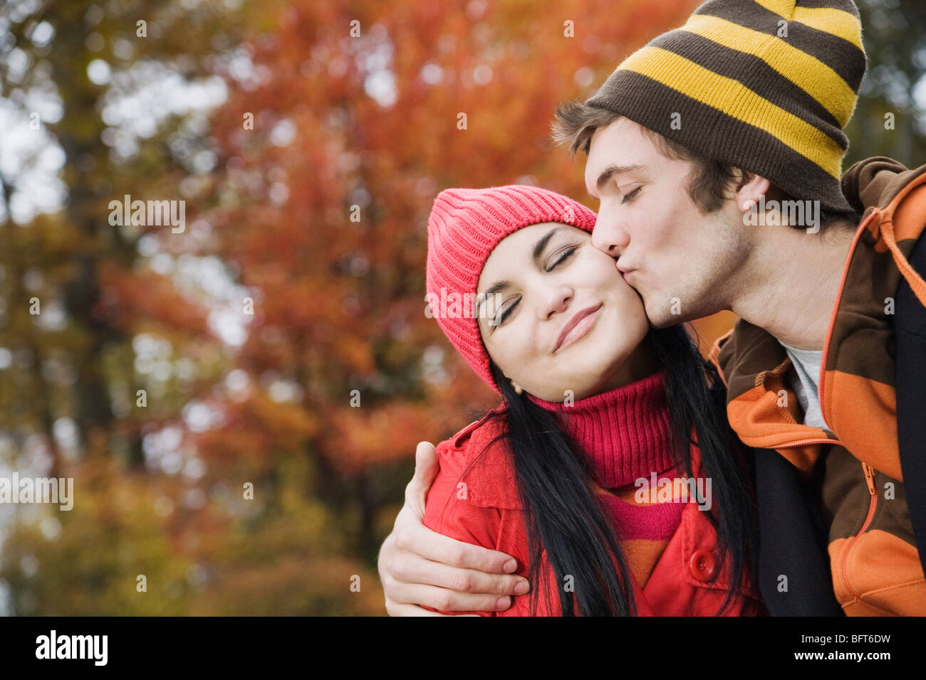Pleased couple in autumn hi-res stock photography and images - Alamy