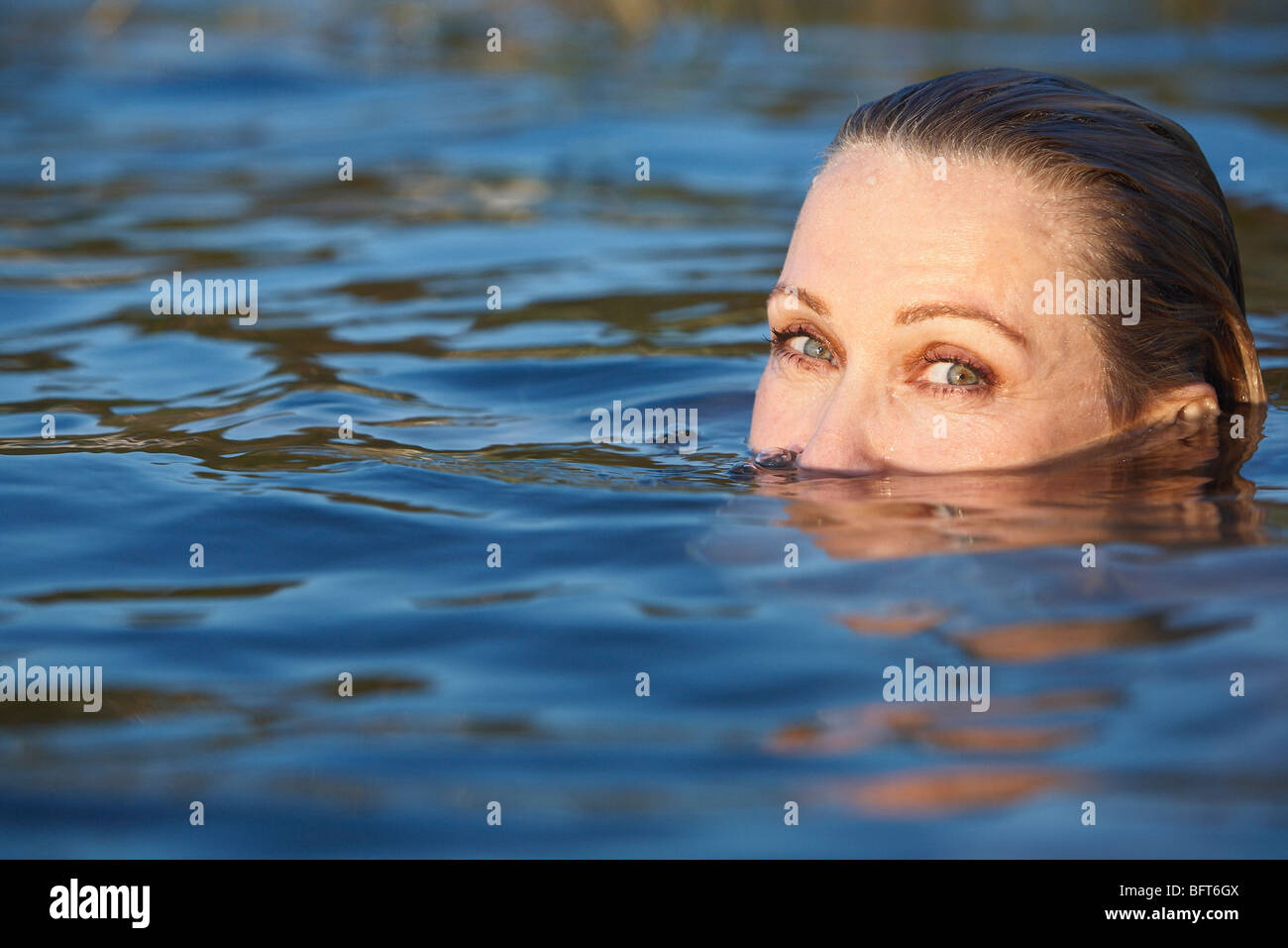 60 year old woman swimming hi-res stock photography and images - Alamy