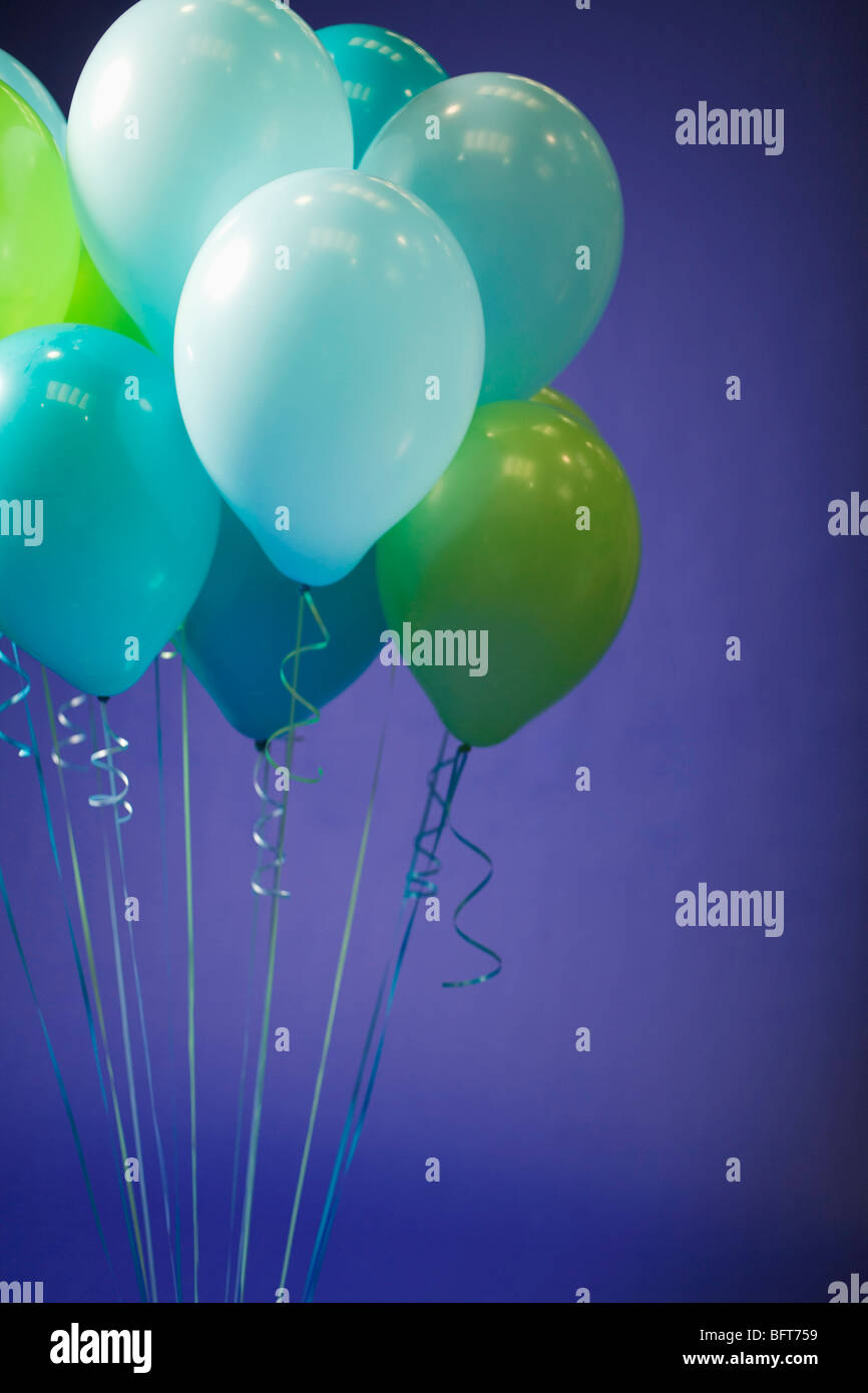 Balloons Against a Blue Background Stock Photo - Alamy