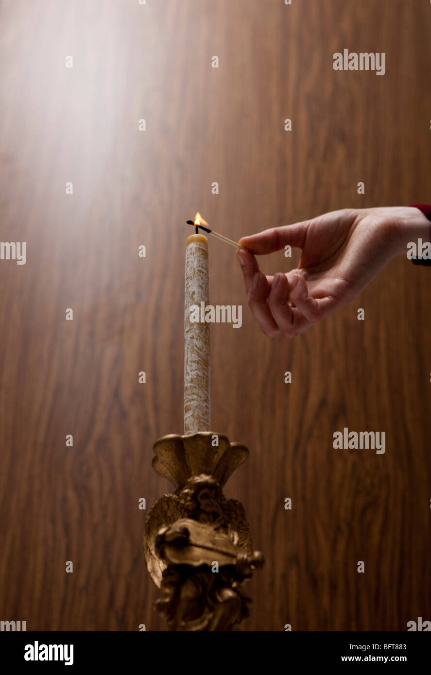 Hand holding candle holder hi-res stock photography and images - Alamy