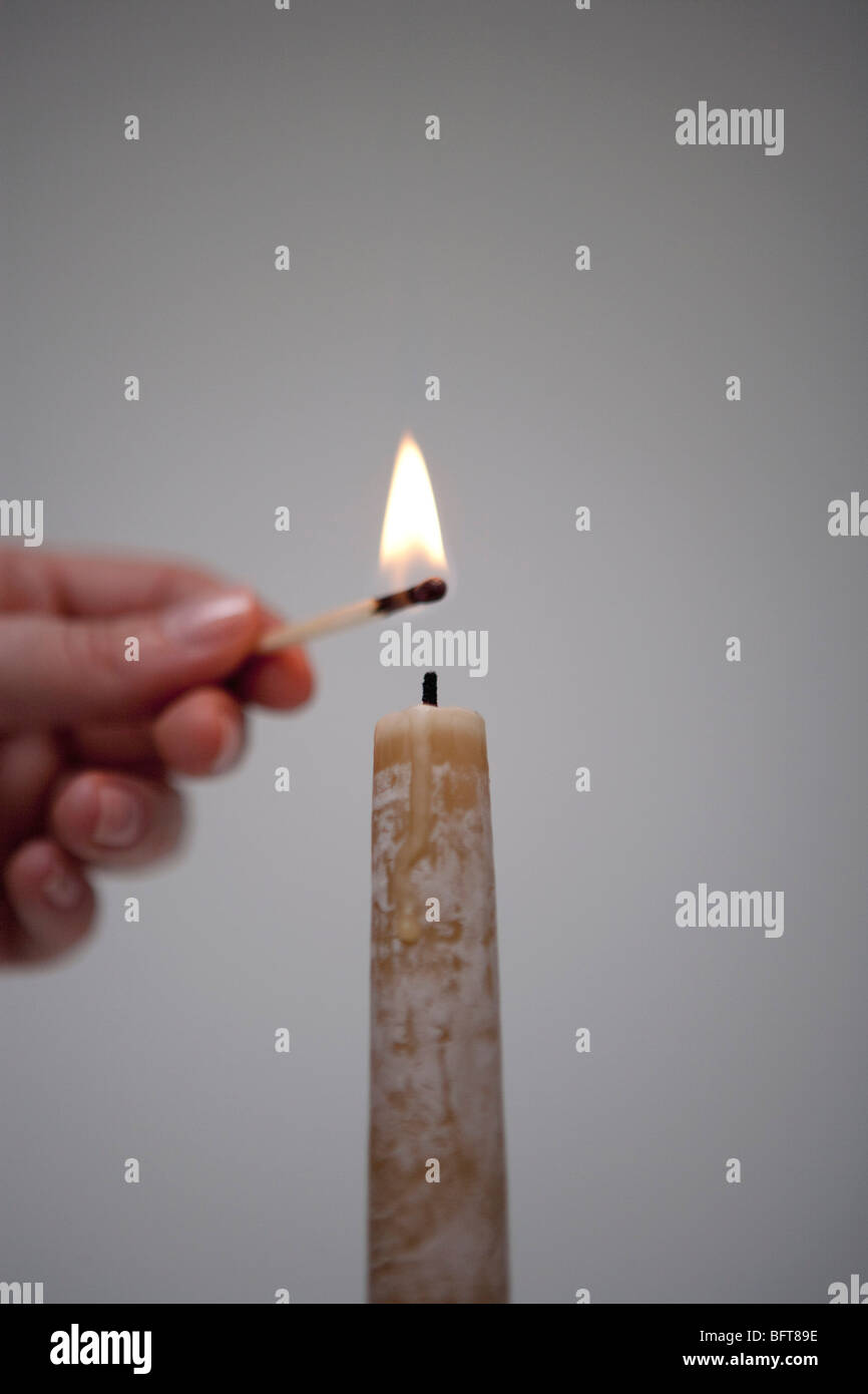 Hand holding candle holder hi-res stock photography and images - Alamy