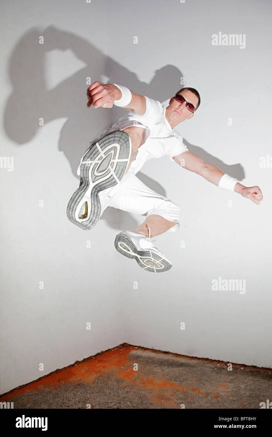 Man Jumping Up in the Air Stock Photo - Alamy