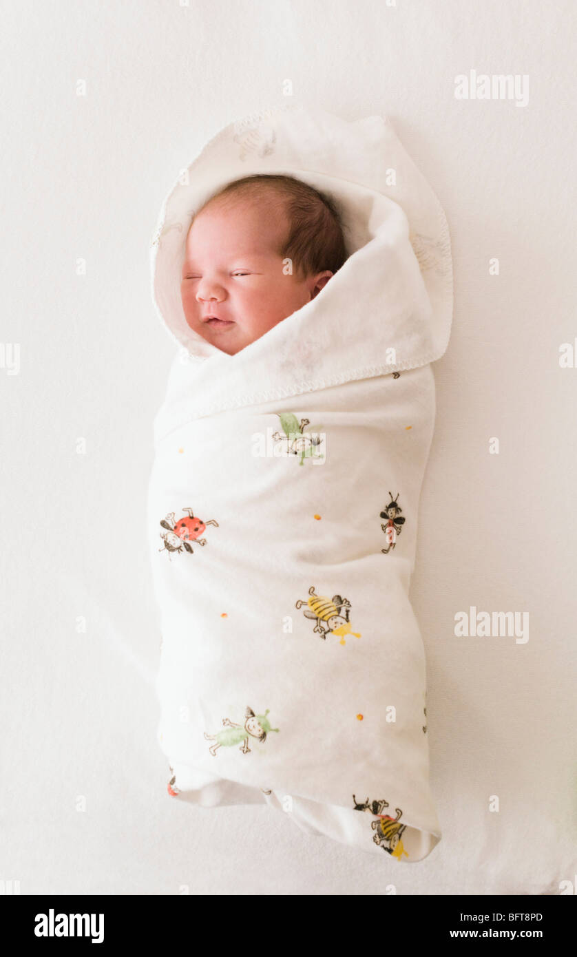 Baby swaddling hi-res stock photography and images - Alamy