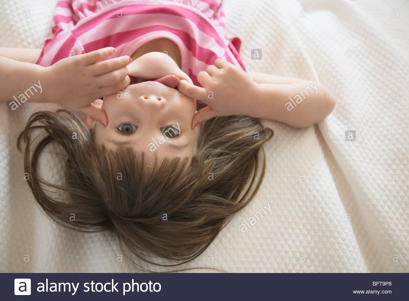 Child Pulling Face Sticking Tongue Stock Photos & Child Pulling Face ...