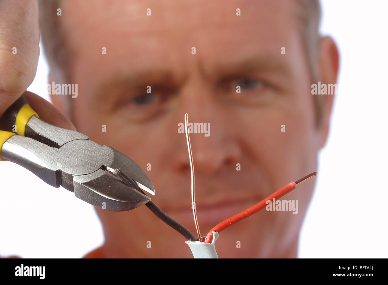 electrician working on wiring Stock Photo - Alamy