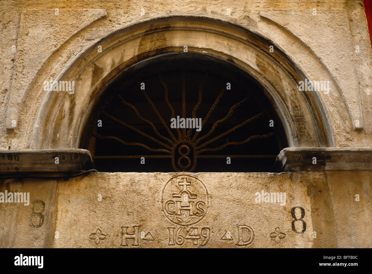 Medieval lintel dated from 1649 in the old town of Nice. This kind of ...