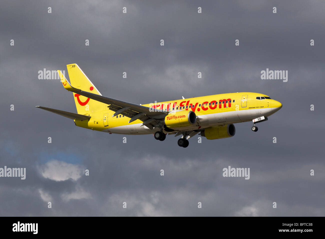 A Boeing B737 series 700 of the German holiday airline TUI Fly on final ...