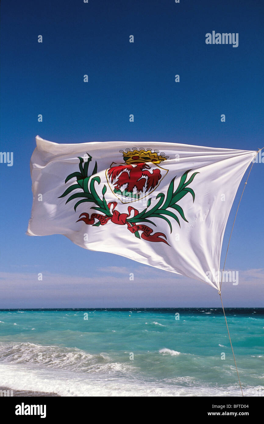 The Nice city flag facing the mediterranean sea on the Promenade des ...