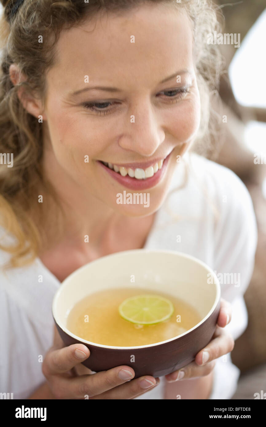 middle-aged woman drinking tea Stock Photo - Alamy