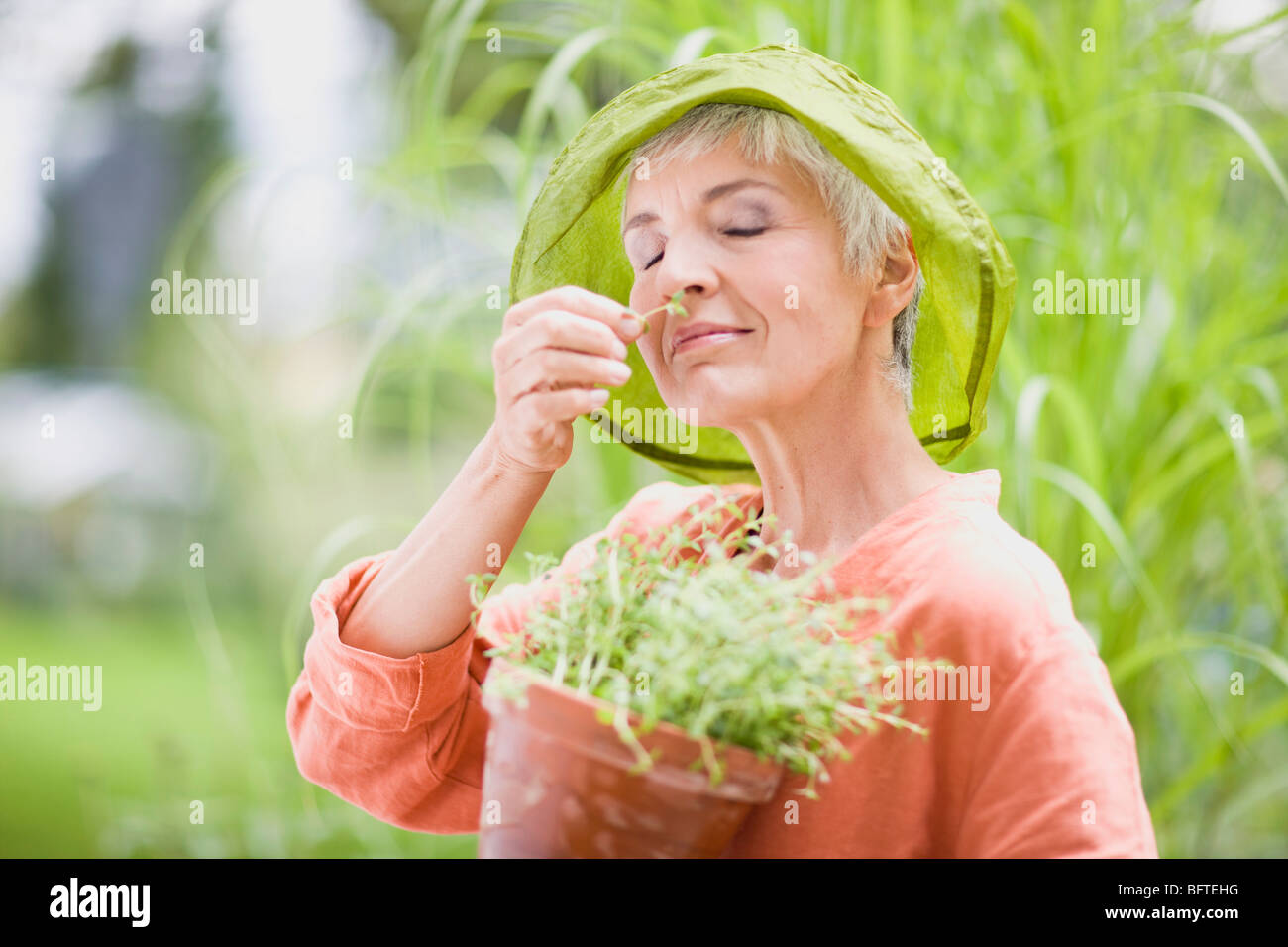 woman in garden Stock Photo - Alamy