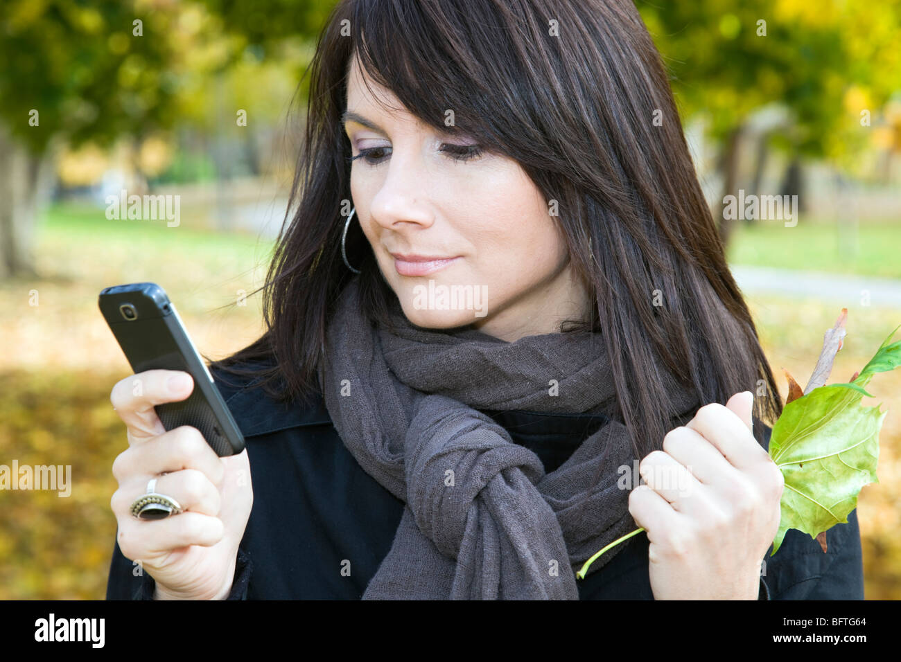 Girl reading text message Stock Photo - Alamy
