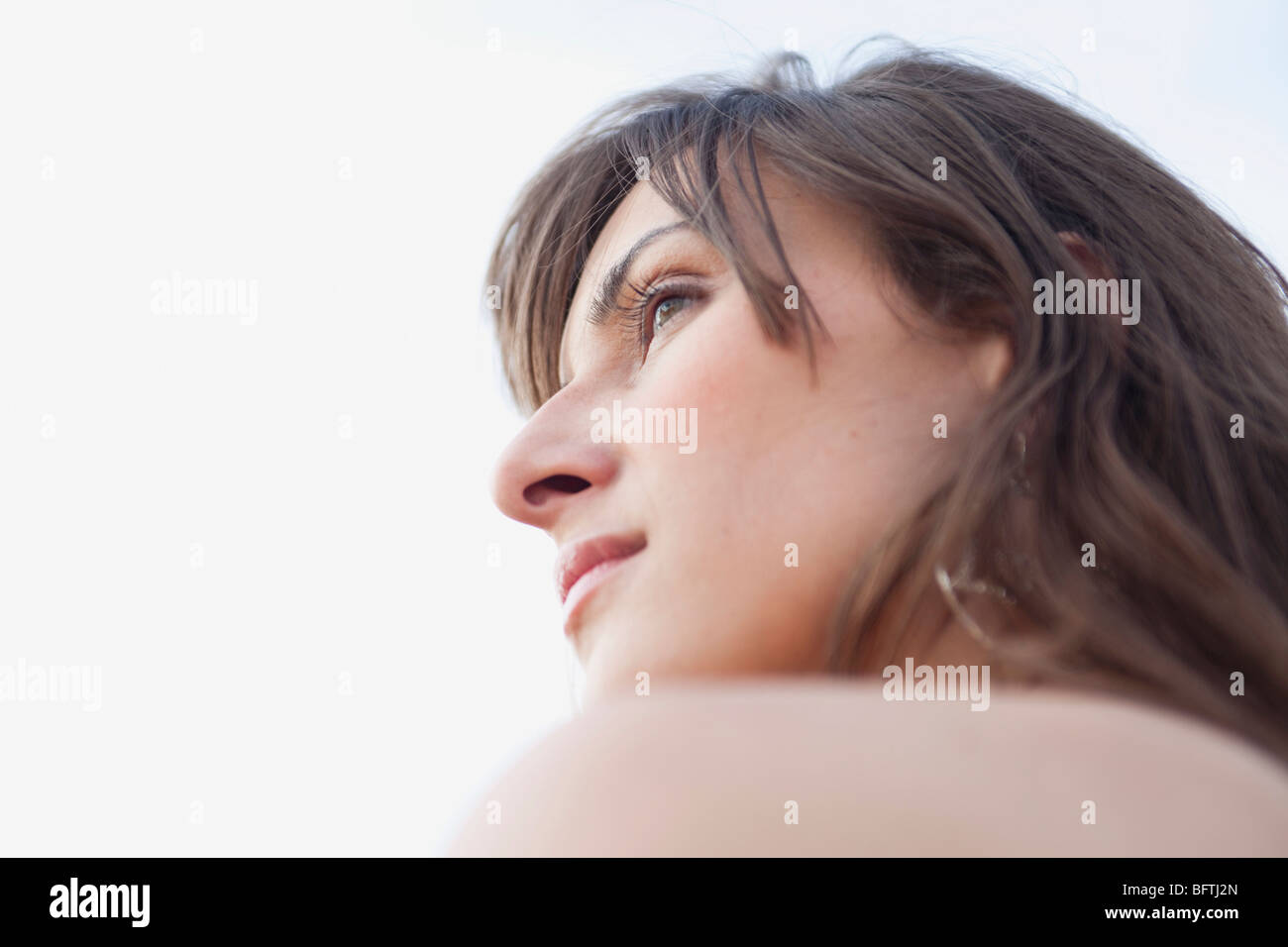 woman looking into distance Stock Photo - Alamy