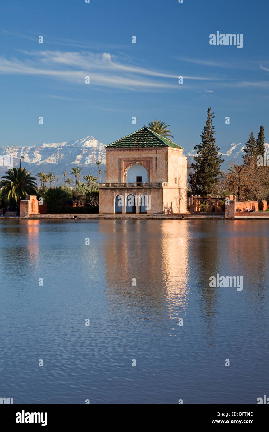 The Pavilion of the Menara with distant Atlas Mountains, Marrakesh ...