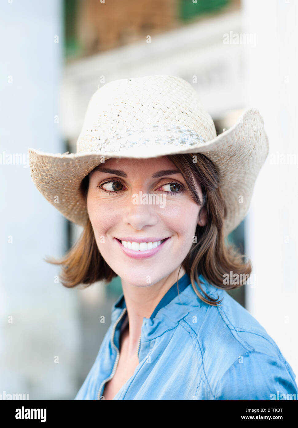 woman with hat smiling Stock Photo - Alamy