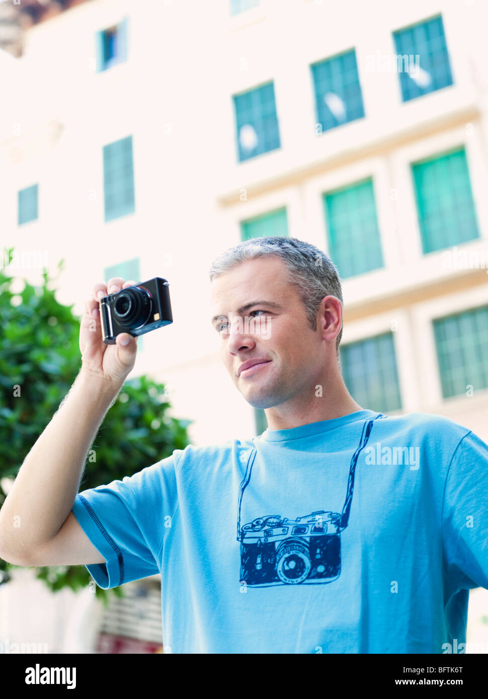 man using camera Stock Photo - Alamy