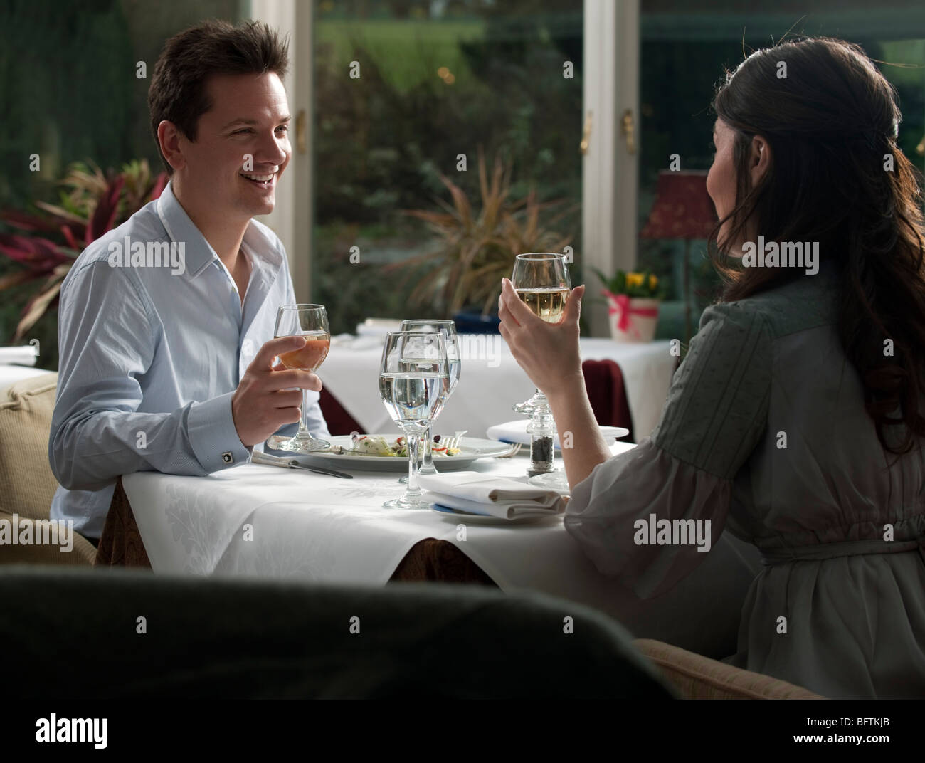 Business people restaurant table night hi-res stock photography and ...