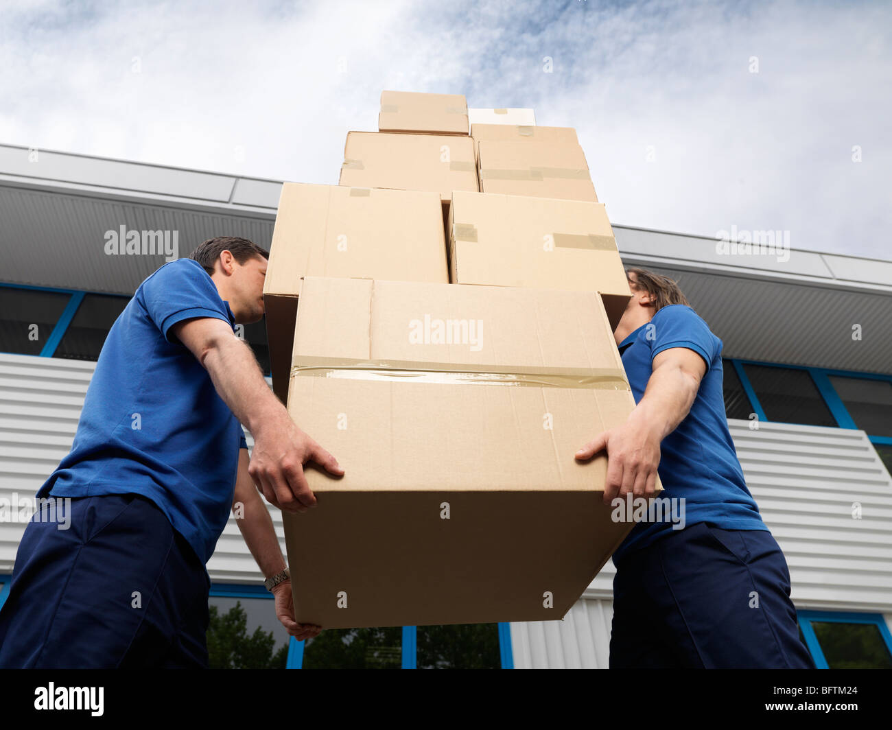 Person Carrying Box Walking High Resolution Stock Photography and ...