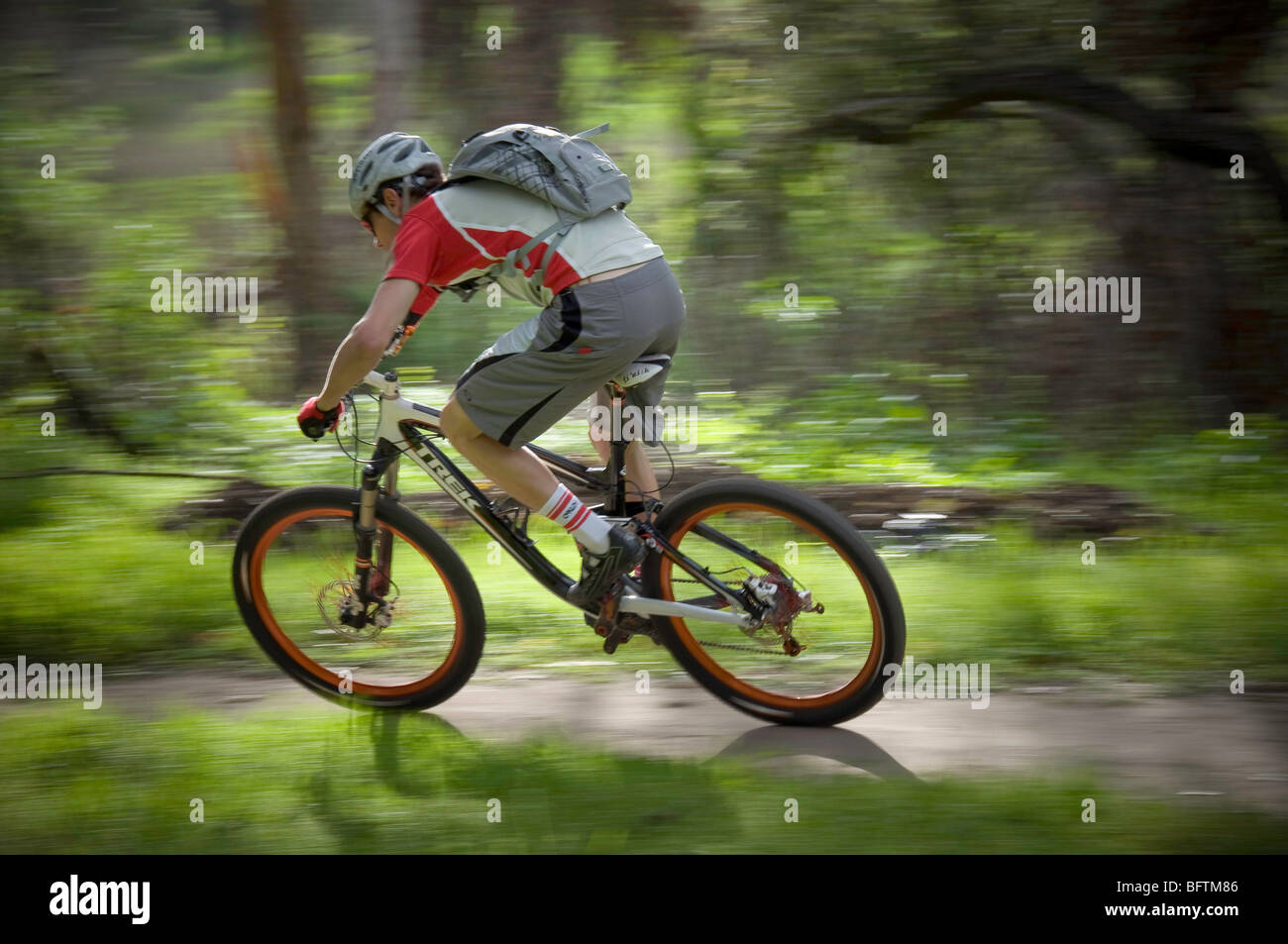 Professional mountain biker Ross Schnell riding his Trek mountain bike ...