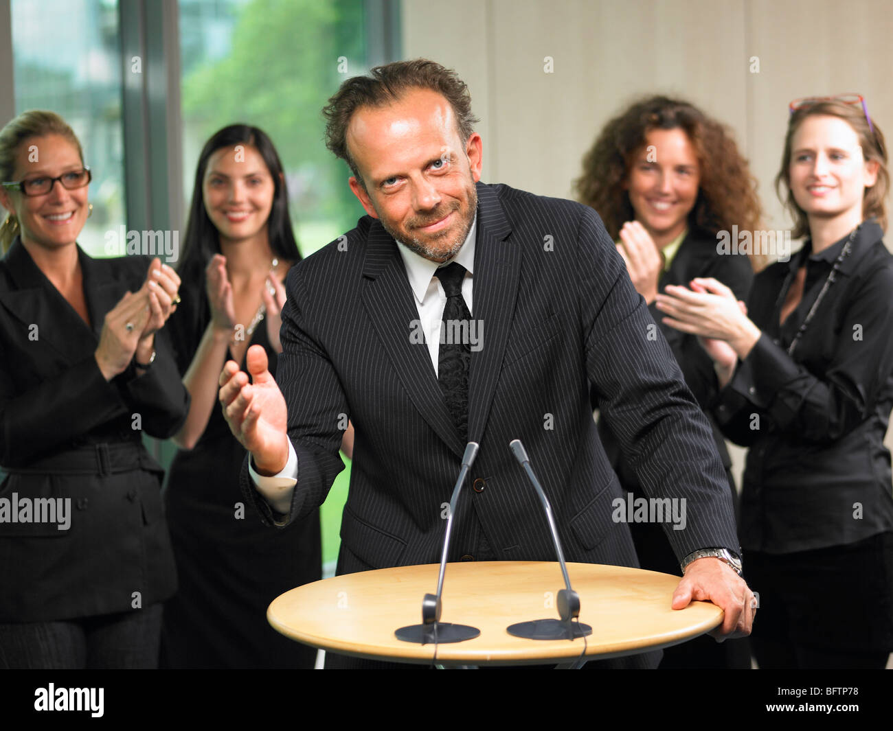 Business man giving a conference Stock Photo - Alamy