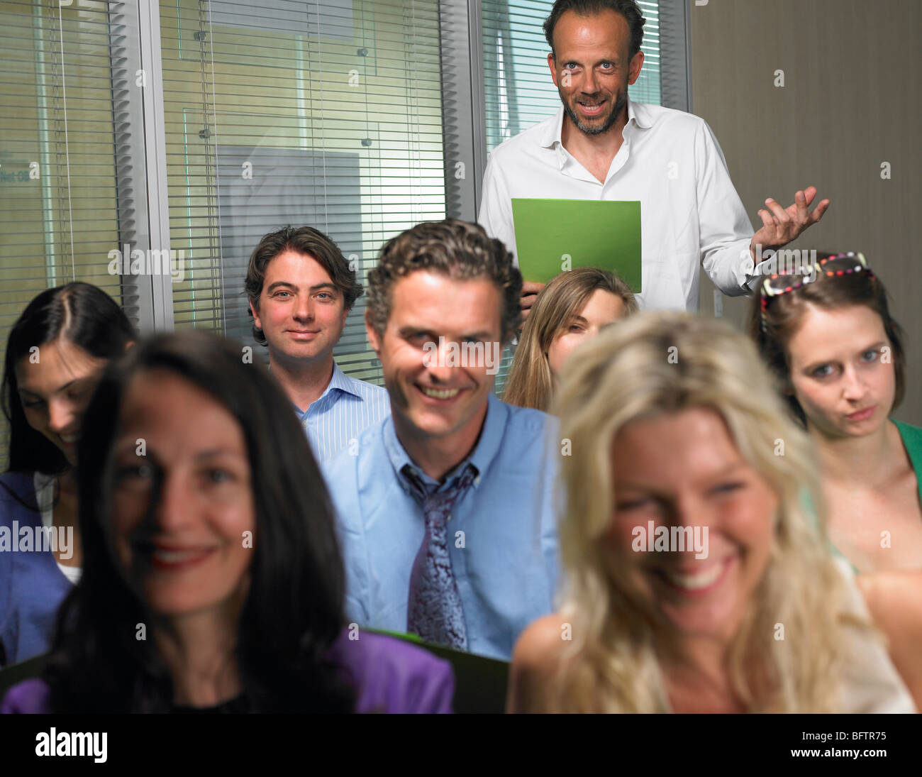 Man standing, asking a question Stock Photo - Alamy