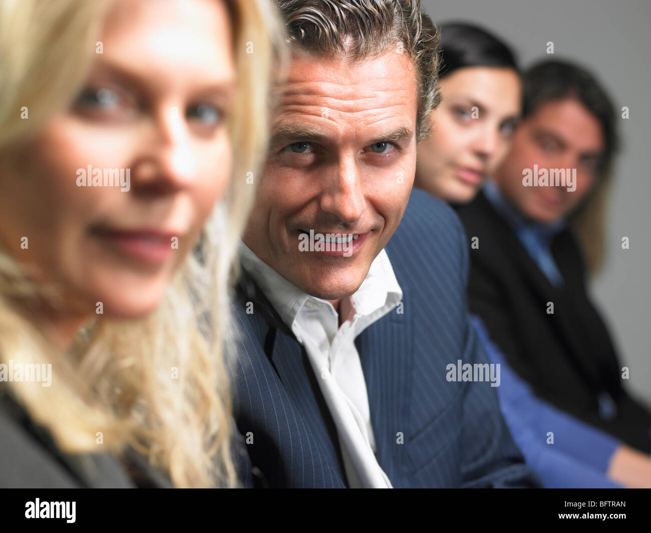 People looking at camera at a conference Stock Photo - Alamy