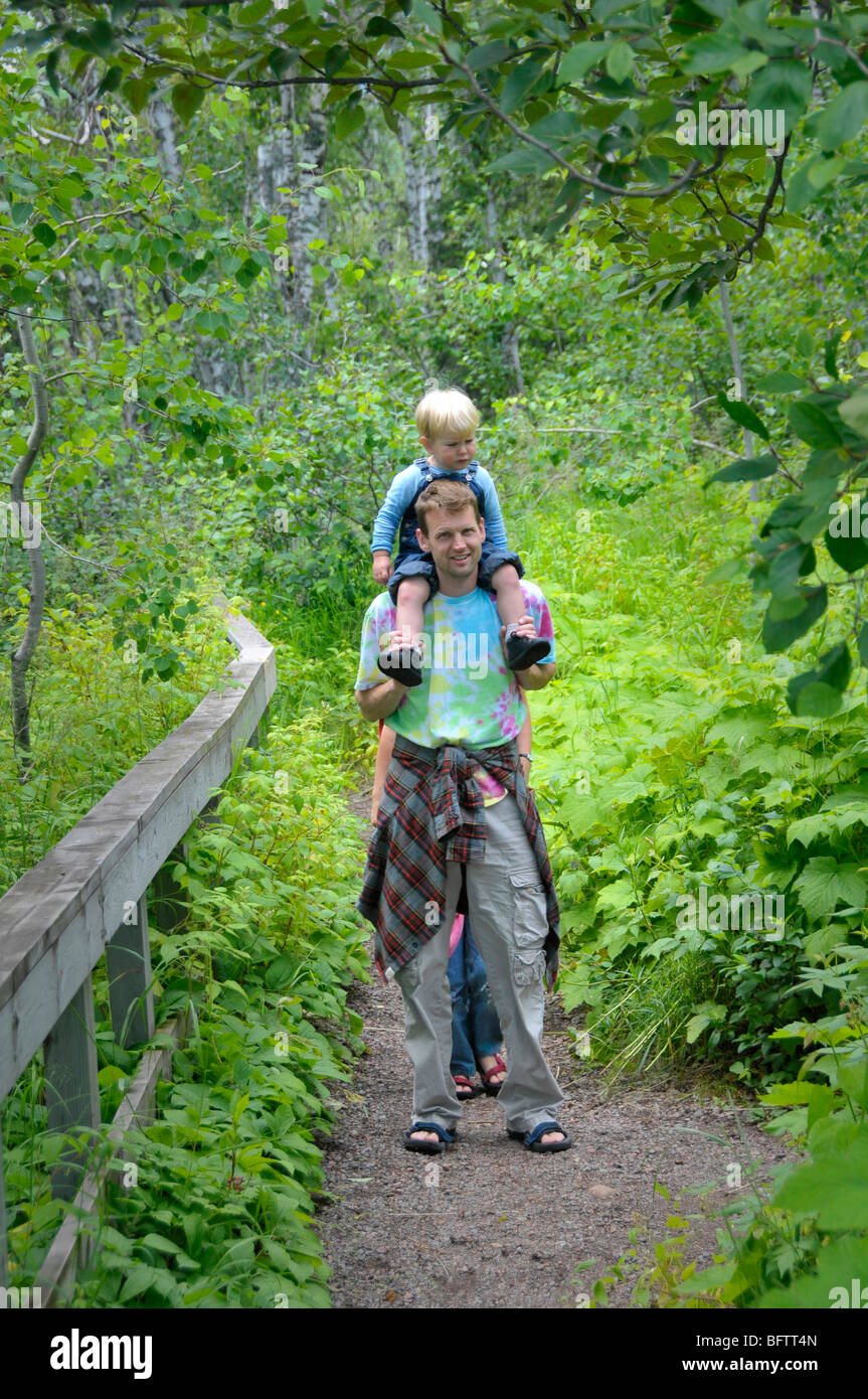 Family walks on trail in Tettegouche State Park Baptism River ...