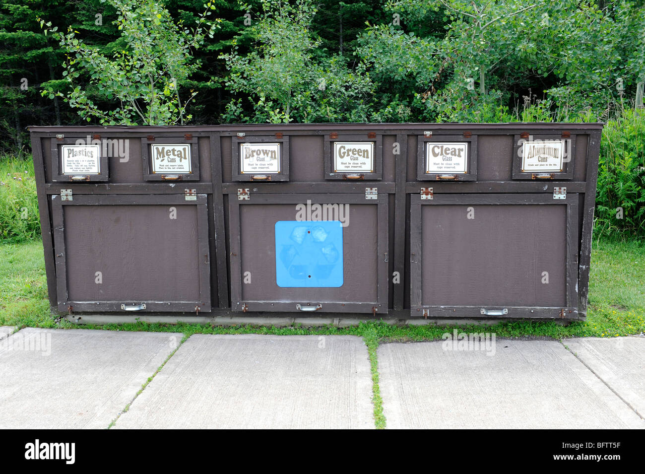 Recycling Bins sort different types of waste Stock Photo - Alamy