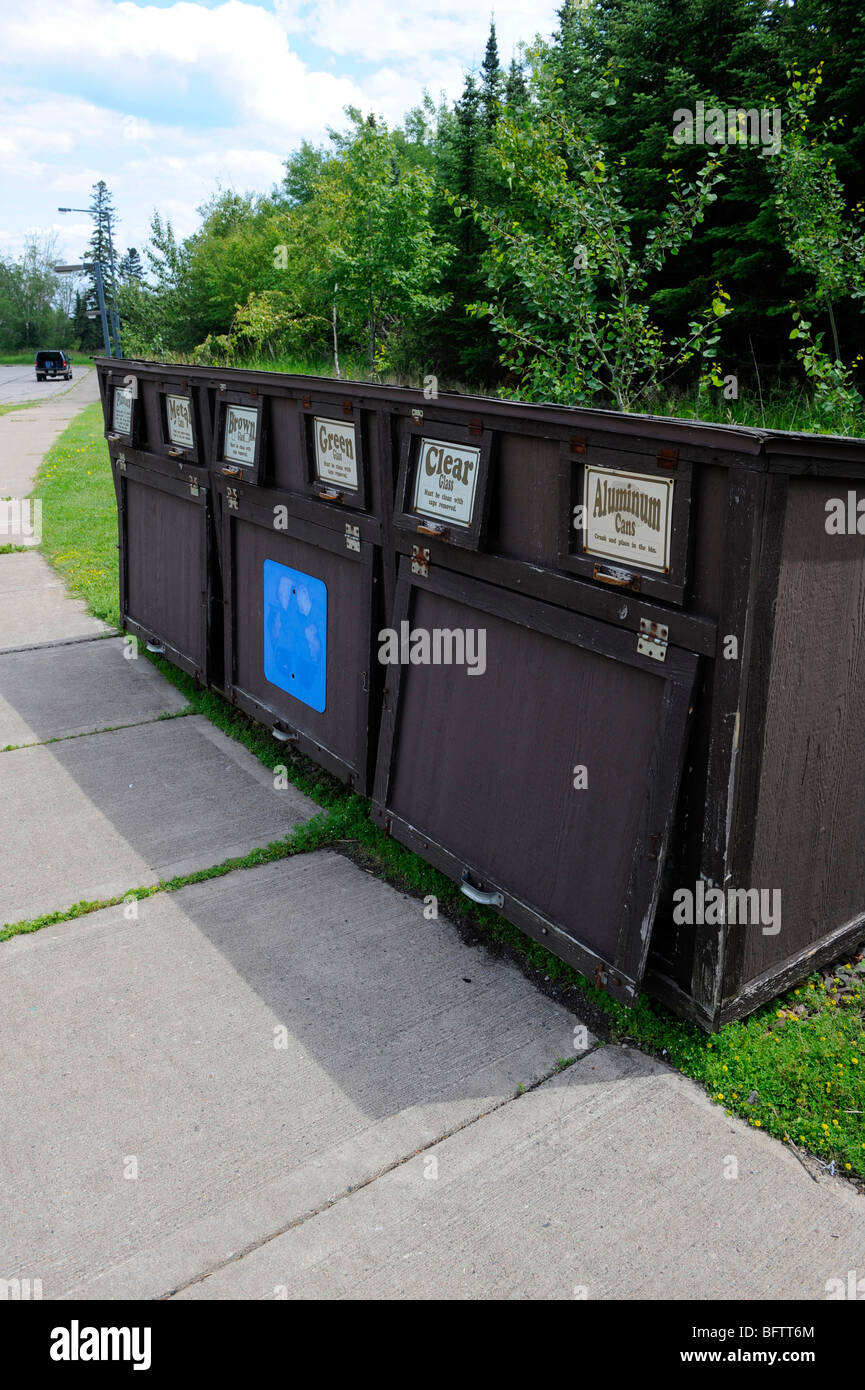 Recycling Bins sort different types of waste Stock Photo - Alamy