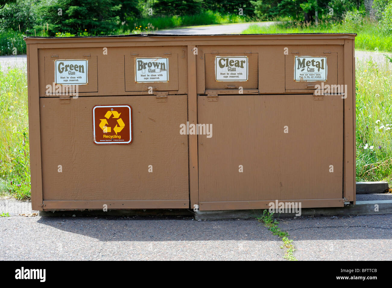 Recycling Bins sort different types of waste Stock Photo - Alamy