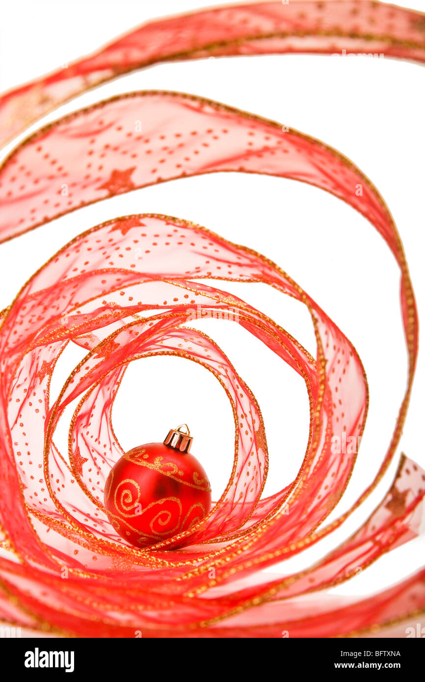 Red Bauble with spiraling red ribbon and a white background Stock Photo ...
