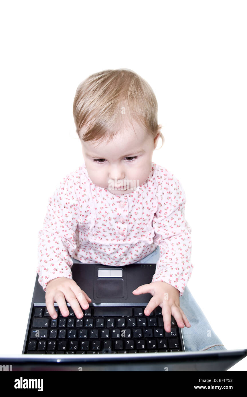 Cute baby printing on computer. Isolated on white background Stock ...