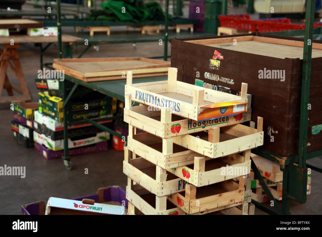 Empty fruit boxes at Saint Georges Market Belfast Stock Photo - Alamy