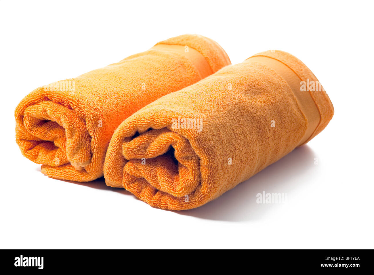 orange towels on white background Stock Photo - Alamy