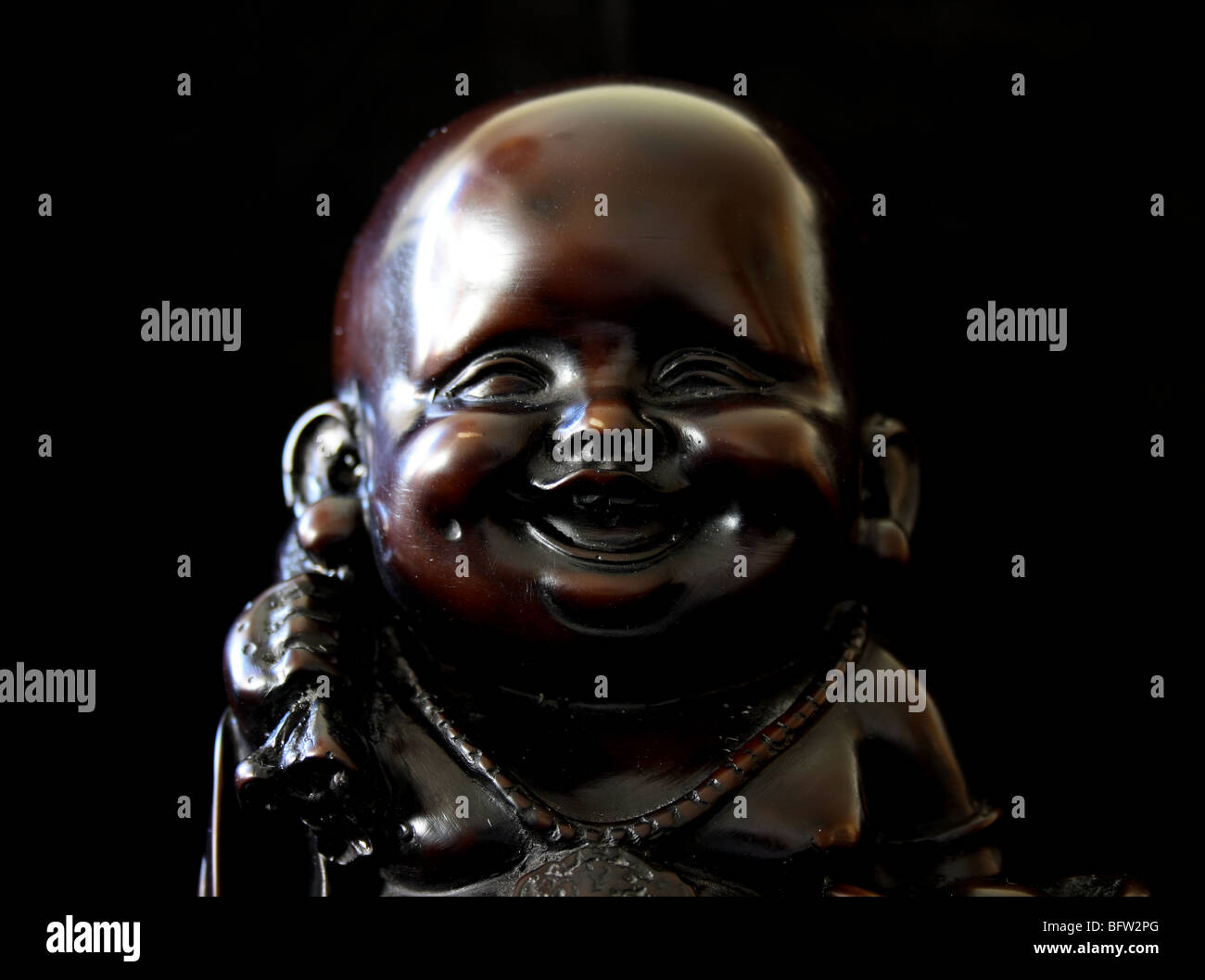 Smiling Buddha to give you some happiness in life Stock Photo - Alamy