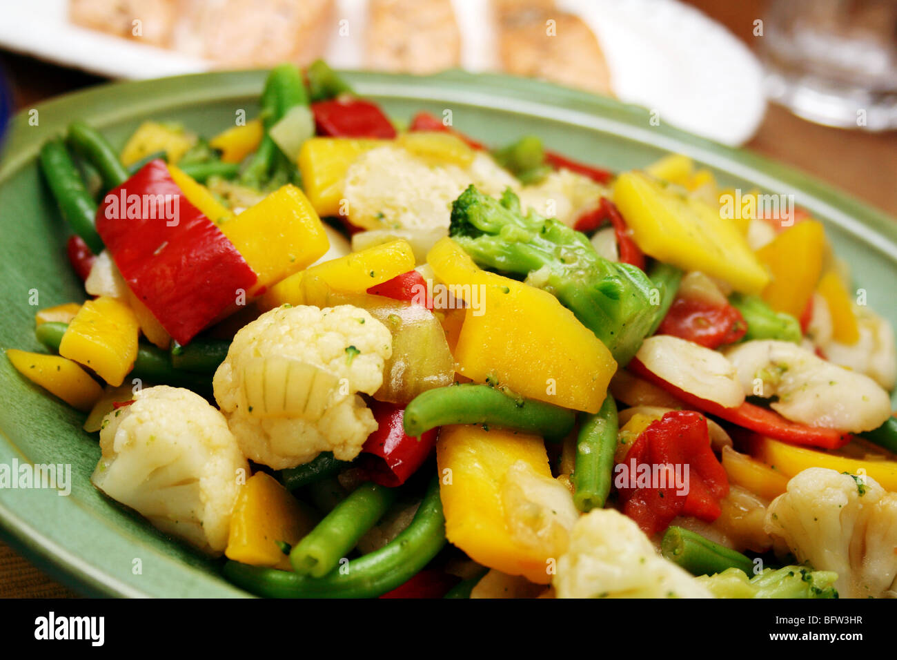 Hot vegetables to be served with salmon Stock Photo - Alamy