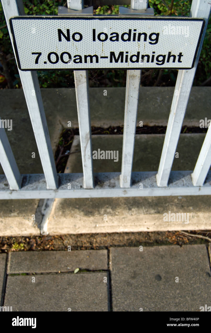 british road sign indicating no loading 7am to midnight, in kingston ...