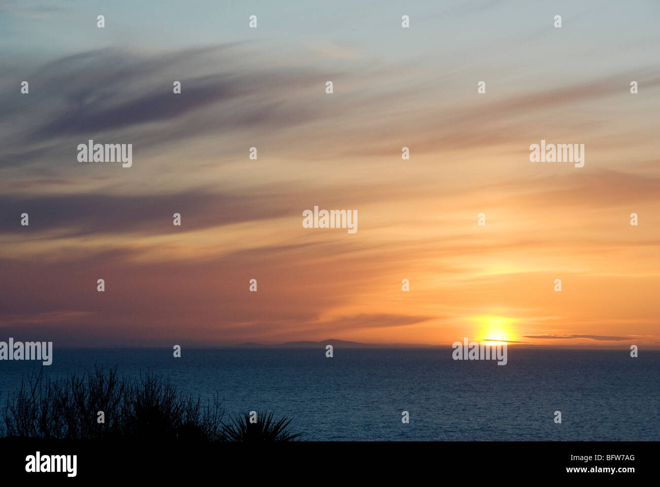 Sunset over the Irish sea from the Isle of Man Stock Photo - Alamy