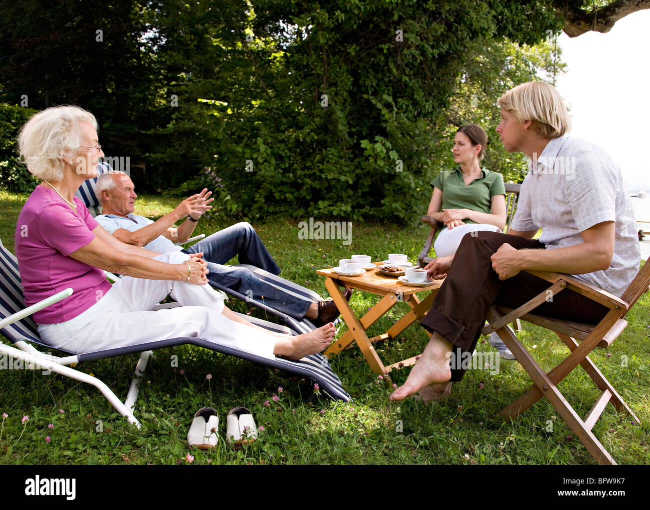 senior couple, man, woman sit together Stock Photo - Alamy